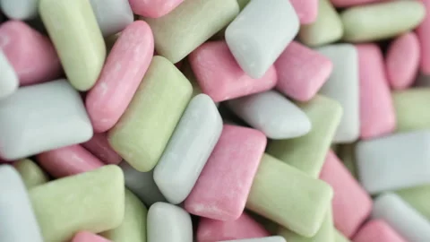 Multi color chewing gum close up, rotati... | Stock Video | Pond5