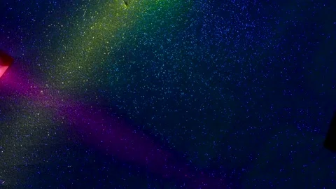 Multi-colored beams of light blink on a ... | Stock Video | Pond5