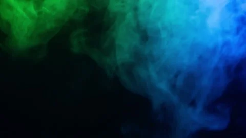 Multi-colored dense vapor moves on a bla... | Stock Video | Pond5
