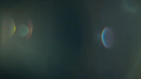 Multicored small moving lens flares with... | Stock Video | Pond5