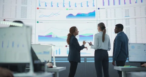 Multiethnic Colleagues Discussing Data O... | Stock Video | Pond5