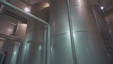Multiple big steel tanks filled up with ... | Stock Video | Pond5