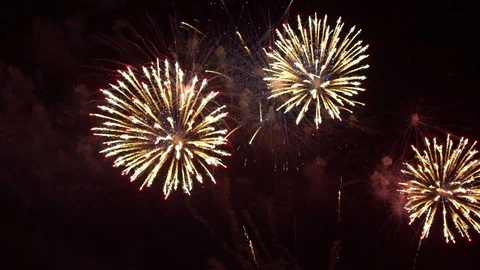 Multiple fireworks fill the night sky ex... | Stock Video | Pond5