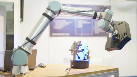 Multiple joint robotic arm scanning a pr... | Stock Video | Pond5