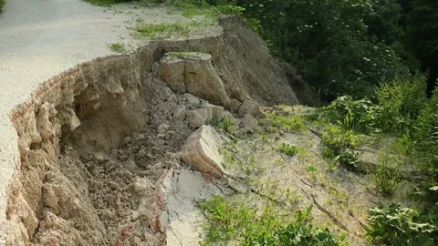 municipal road collapsed due to heavy ra... | Stock Video | Pond5