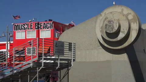 Muscle Beach Sign with American Flags at... | Stock Video | Pond5