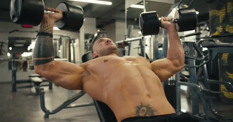 Muscular bodybuilder man lifting heavy w... | Stock Video | Pond5