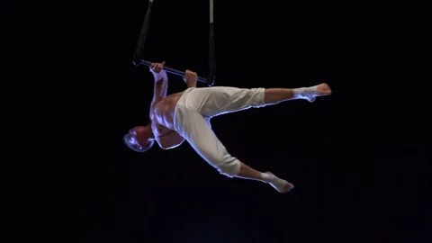 Muscular male aerial circus artist perfo... | Stock Video | Pond5