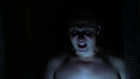 A muscular man screaming. | Stock Video | Pond5