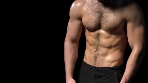 Muscular shirtless man playing with abdo... | Stock Video | Pond5