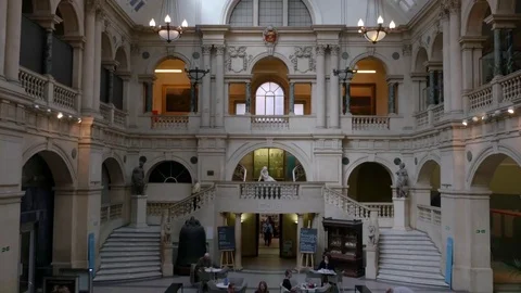 Museum atrium, people sitting | Stock Video | Pond5