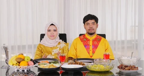 Muslim couple show a greeting hand gestu... | Stock Video | Pond5