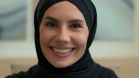 Muslim islamic female lady in hijab look... | Stock Video | Pond5