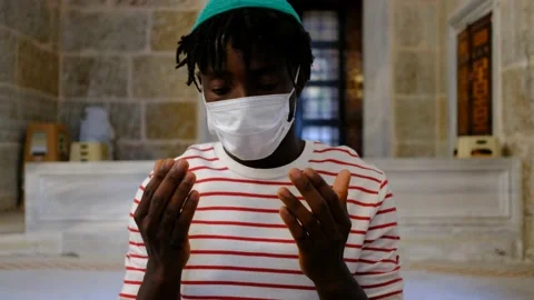 Muslim Man Mask, Black Man mask worship | Stock Video | Pond5