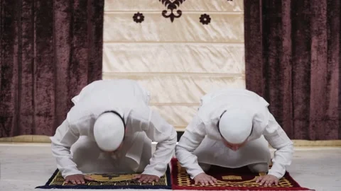 Muslim men doing Sujud prayer at home | Stock Video | Pond5