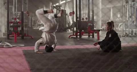 Muslim woman doing headstand drill near ... | Stock Video | Pond5