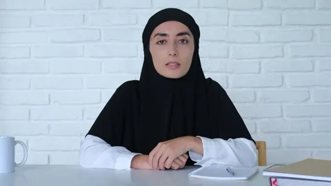 Muslim woman gives interview. Close-up o... | Stock Video | Pond5
