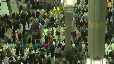 Muslims filing into women's prayer secti... | Stock Video | Pond5