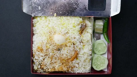 mutton biryani meal in take away packet | Stock Video | Pond5