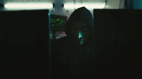 Mysterious cyber security hacker in hood... | Stock Video | Pond5