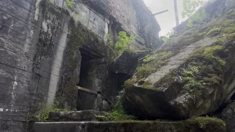 Mysterious entrance into the remains of ... | Stock Video | Pond5