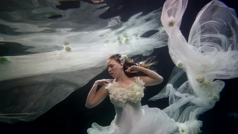 mysterious female figure underwater, dre... | Stock Video | Pond5