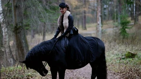 mysterious woman on black stallion in ma... | Stock Video | Pond5