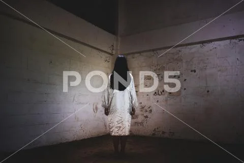 Mysterious Woman, Horror scene of scary ghost woman at the dark corner ...