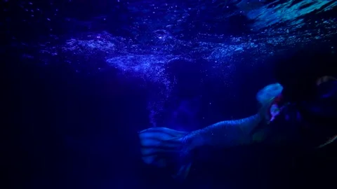 mystery of ocean depth, mermaid is swimm... | Stock Video | Pond5