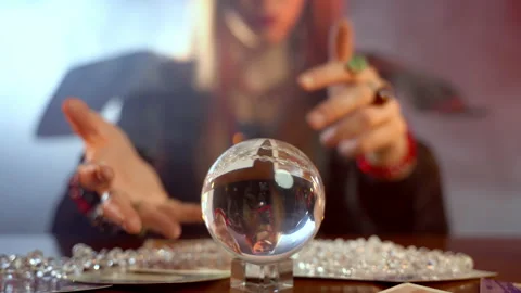 Mystery ritual with round crystal ball i... | Stock Video | Pond5