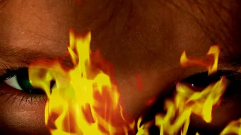 Mystery scary eyes and fire, flame. Cree... | Stock Video | Pond5