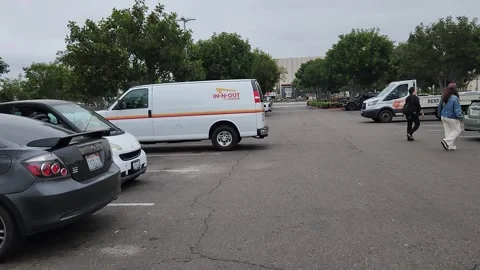 In-N-Out Vehicle Van Parking Lot Street | Stock Video | Pond5
