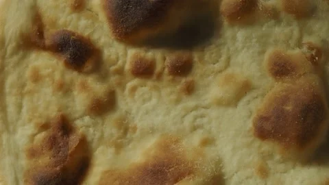 Naan bread texture as background | Stock Video | Pond5
