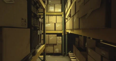 Narrow aisle in a storage facility fille... | Stock Video | Pond5