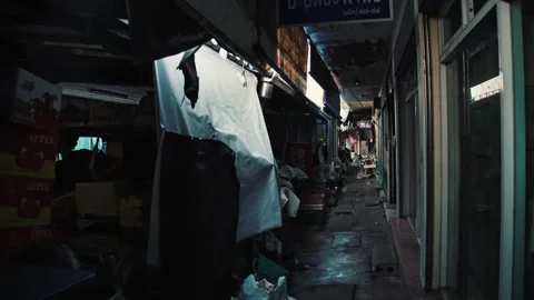 A narrow alley behind a market in Thaila... | Stock Video | Pond5