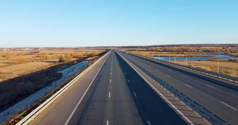 Narrow two - lane road,cars moving along... | Stock Video | Pond5