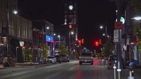 Narrow view of night traffic at stop lig... | Stock Video | Pond5