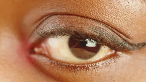 Native African American woman eye, half-... | Stock Video | Pond5