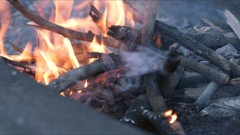 Native American burning wooden log to ma... | Stock Video | Pond5