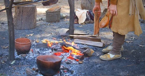 Native American Cooking Over a Fire, Ree... | Stock Video | Pond5