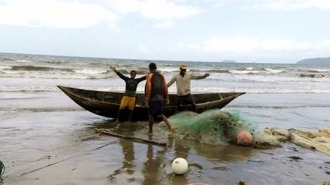 Native fisher woman fishing on sea, usin... | Stock Video | Pond5
