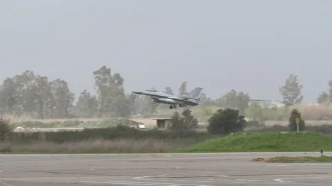 NATO fighter jet landing on a military a... | Stock Video | Pond5