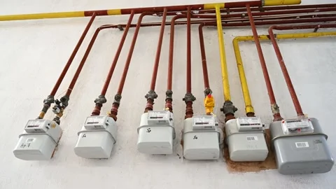 Natural gas meters with yellow pipes in ... | Stock Video | Pond5