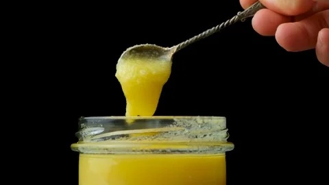 Natural ghee healthy oil, black backgrou... | Stock Video | Pond5