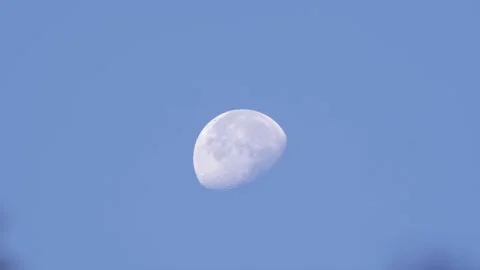 Natural moon on blue morning sky | Stock Video | Pond5