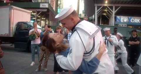Navy sailor Acts Out the Famous WW2 Kiss... | Stock Video | Pond5