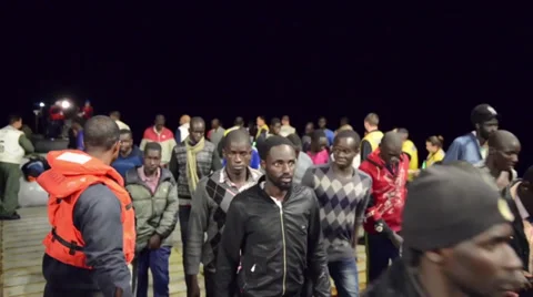 Navy Ships rescue people from Sinking Ve... | Stock Video | Pond5