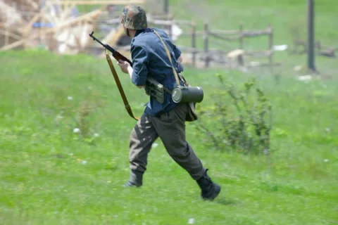 Nazi soldier running into battle | Stock Video | Pond5