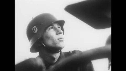 Nazi soldiers watch as the Luftwaffe pas... | Stock Video | Pond5