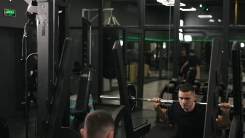 Neck weights, Strength training, Squat p... | Stock Video | Pond5